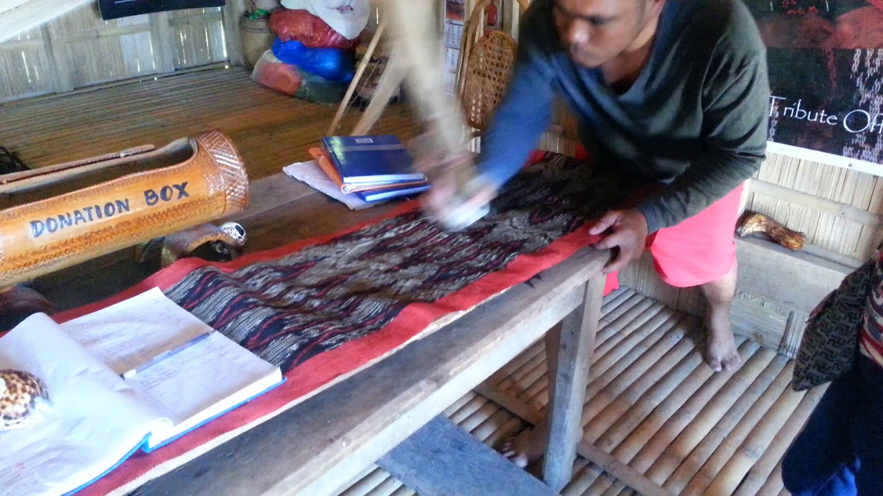 The Final Process in Traditional Weaving of Abaca Fibers to Flatten and ...