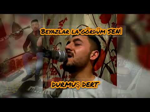 Durmuş sert beyazlarla gördüm seni