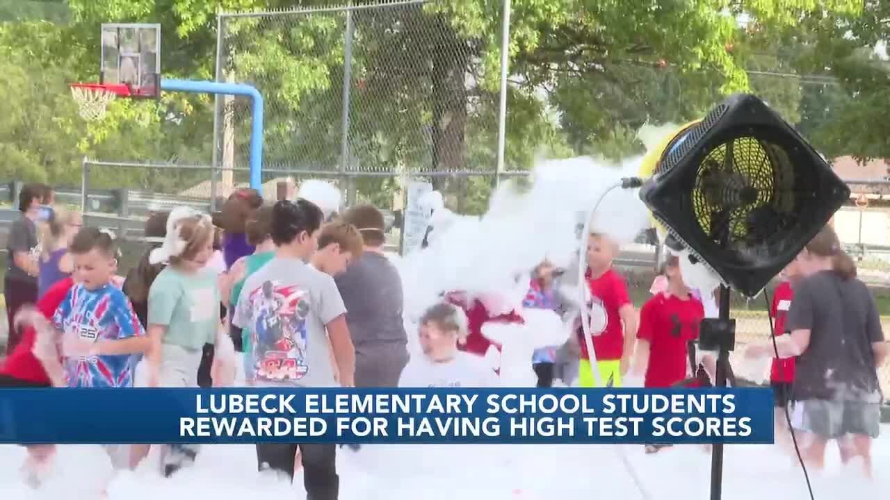 Lubeck Elementary rewarded students with foam pit - YouTube