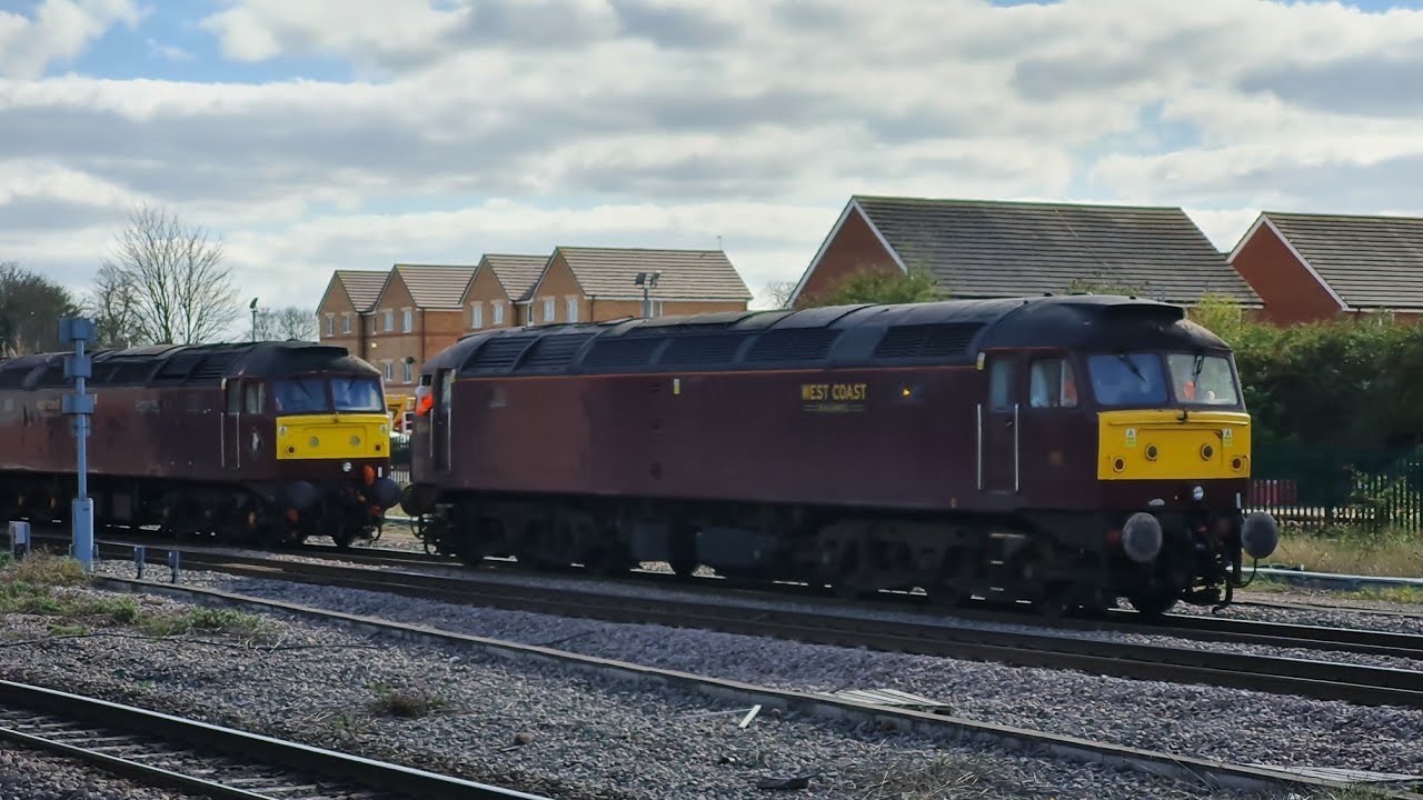 Thrashing out of Peterborough is West Coast Railways 47804 and 47772 ...