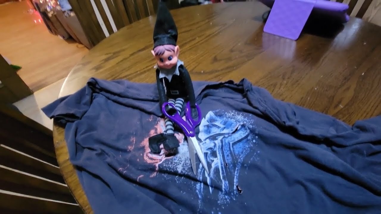 Evil Elf On The Shelf Is Up To No Good And He Is Tearing The Family ...