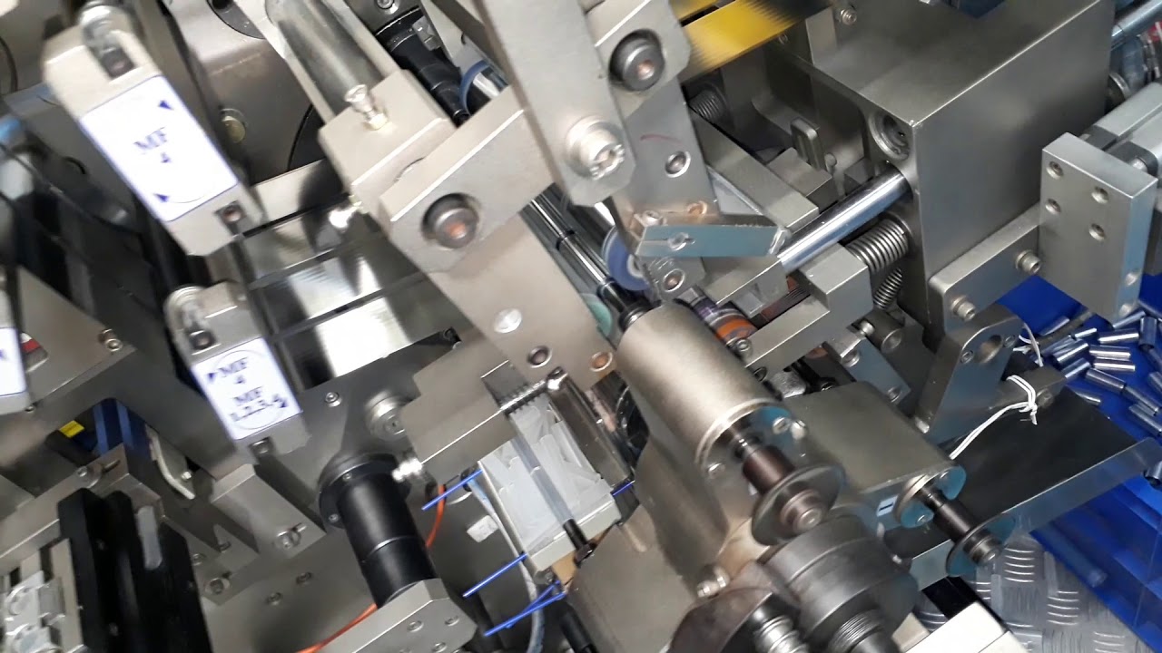 Automatic capacitor winding machine - YouTube