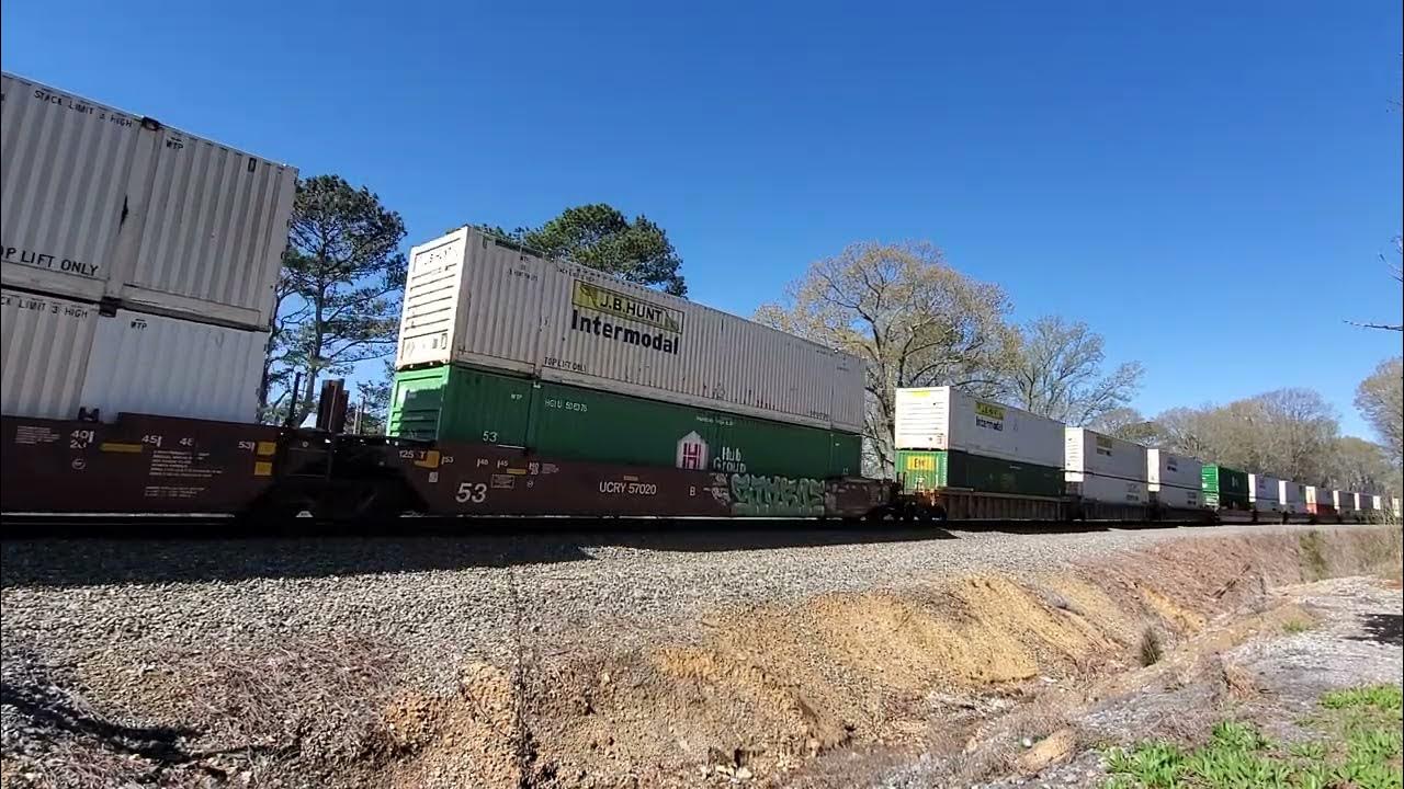 BNSF 3989 leads the short southbound stack & rack at Alabama Rd - YouTube