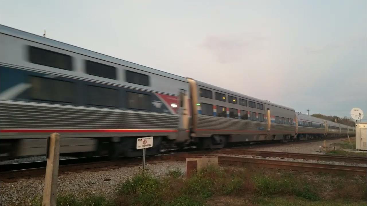An amtrak train with a Phase 7 (VII) Viewliner, horn show, and double diamond Interlocking ...