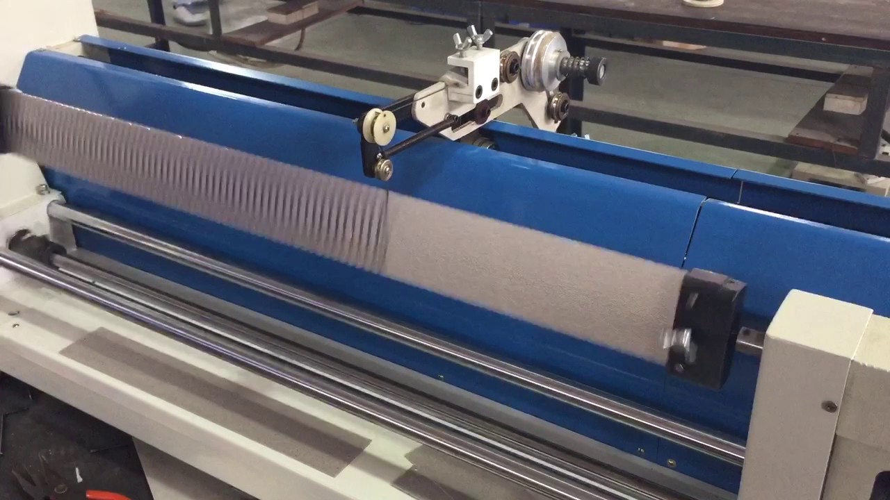 Lengthened mica plate winding machine - YouTube