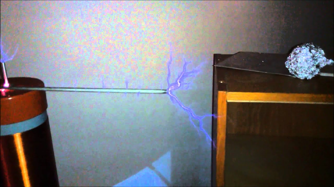 Some experiments with NST tesla coil - YouTube
