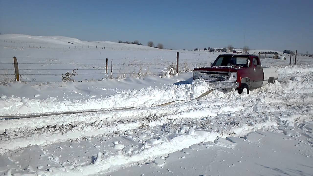 Hummer H1 pulling chevy out of snow. - YouTube