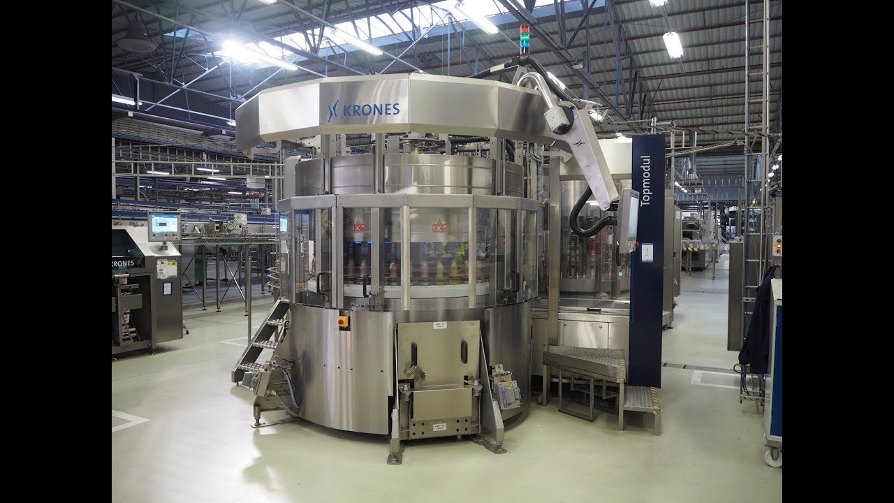430-1: Krones AG shrink sleeve machine - YouTube
