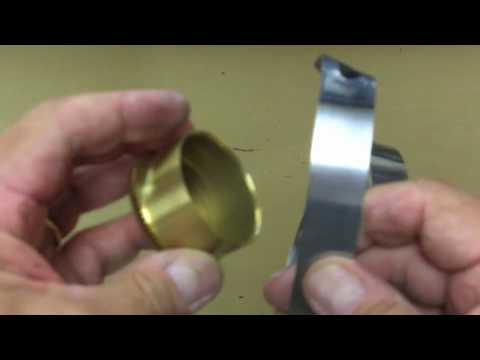 Installing a clock mainspring - YouTube
