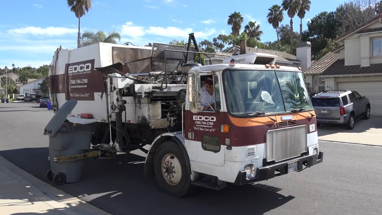 1995 White GMC WXLL Bridgeport Side Loader - YouTube
