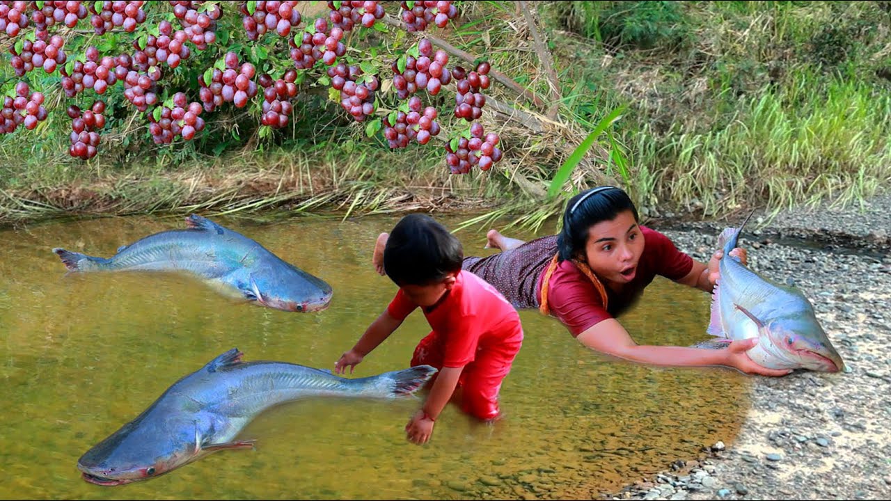 Baby boy and Wild Women Spotted big fish in water and pick Grapes for ...