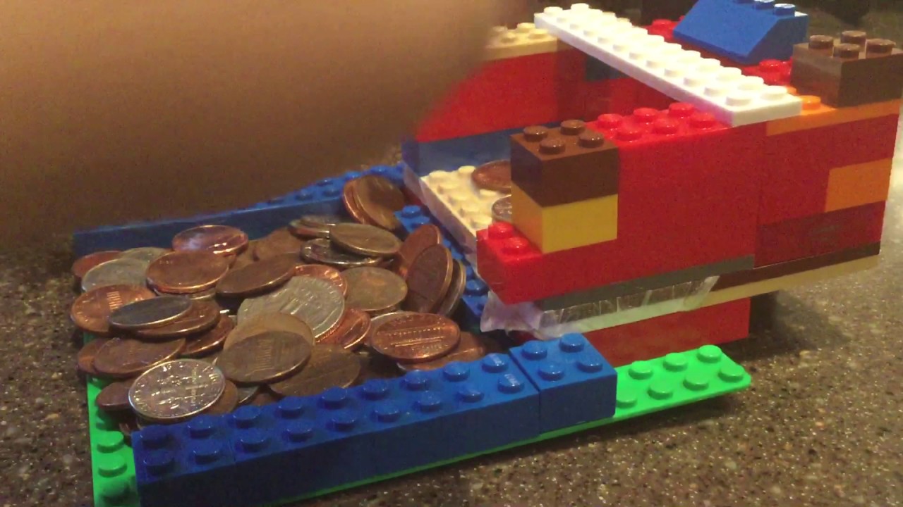 My home-made coin pusher machine (out of legos!) review. - YouTube