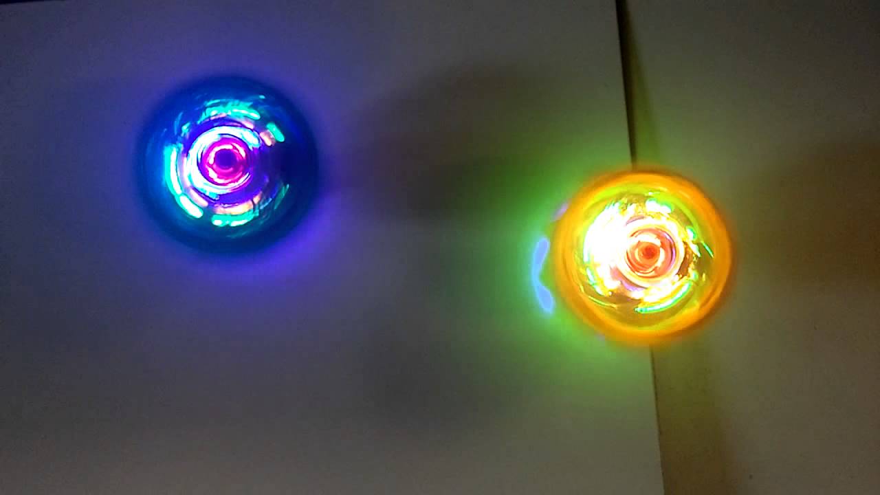 Light up Friction Spinning Top with Music - YouTube