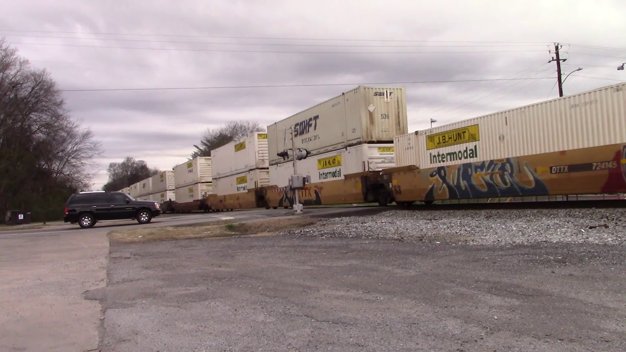 BNSF 3785, and Citirail 1428 lead a Intermodal train through Rockmart ...