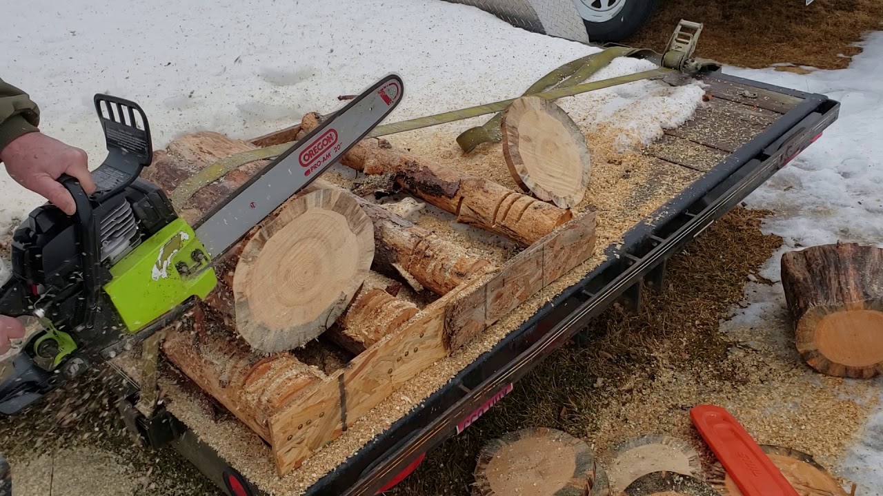 Green Ripper with 20 inch bar cutting 13 inch wood - YouTube