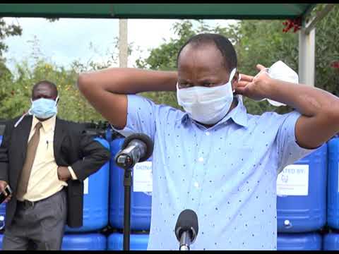 Makueni Health CEC Dr. Andrew Mulwa demonstrates on how to wear face ...
