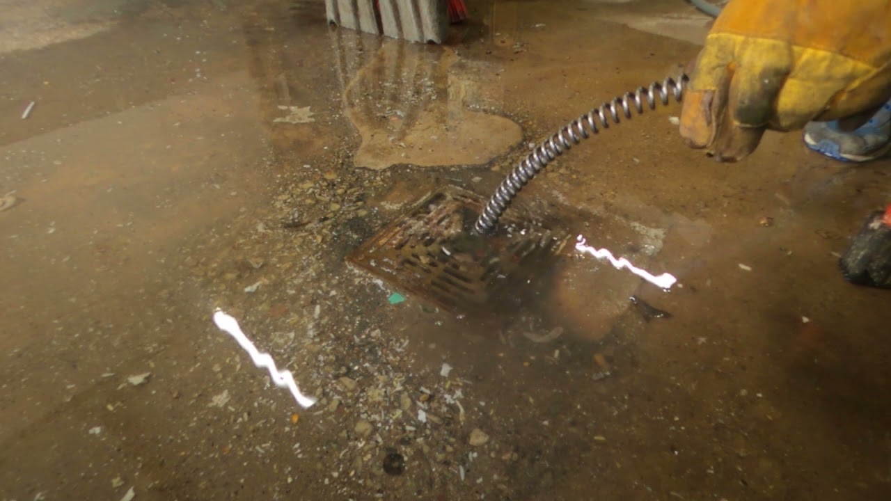 How to unclog compactor room floor drain. - YouTube