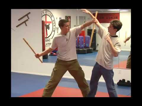 How to Defend Against a Knife Stab with Escrima Sticks - YouTube