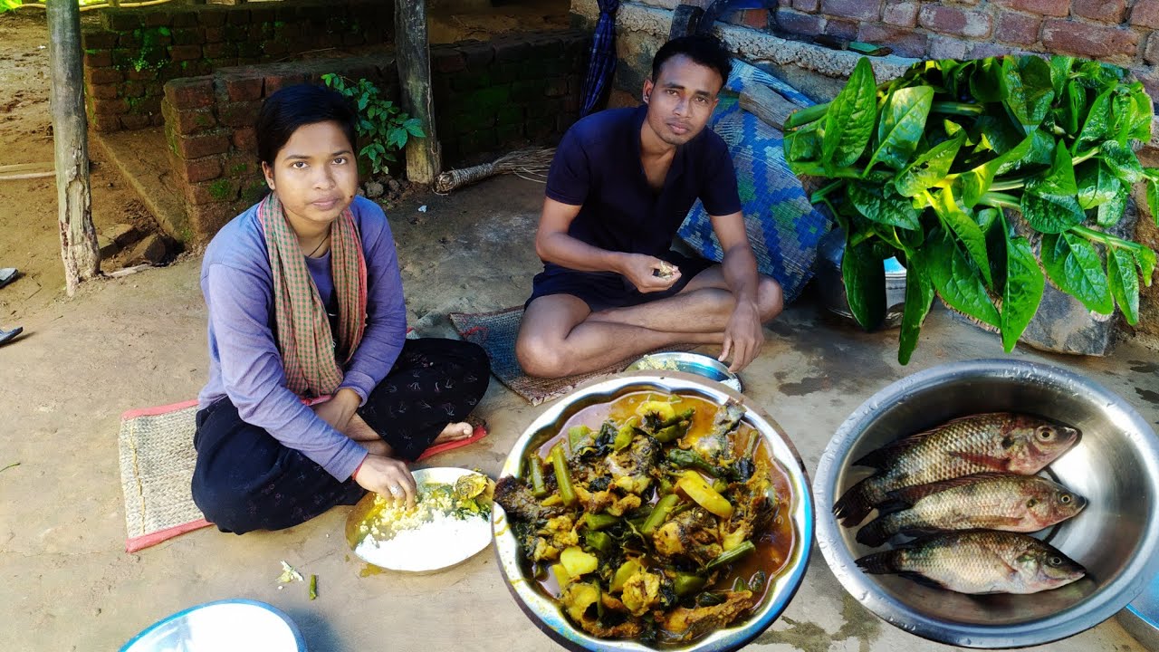 Santali house cooking fish curry village style cooking by village girl ...