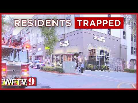 Florida apartment building emergency evacuation: residents trapped in rooms for hours