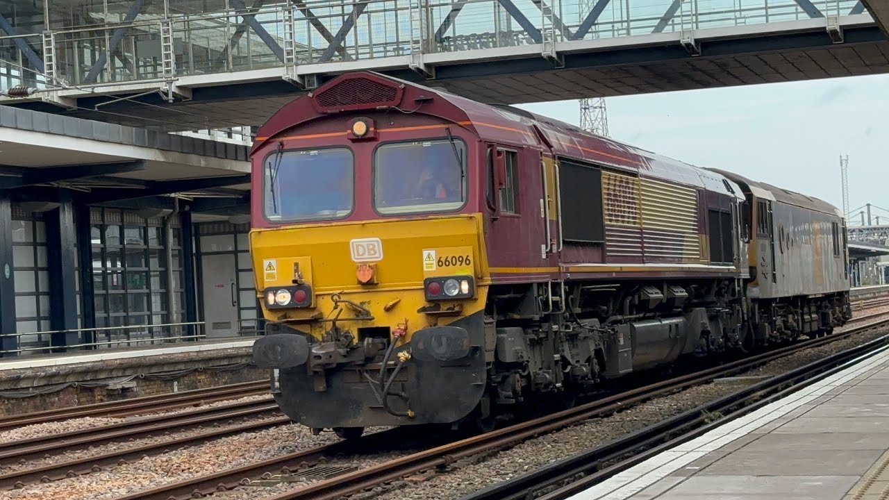 DB 66096 dragging EWS livery Class 92 92011 through Ashford ...