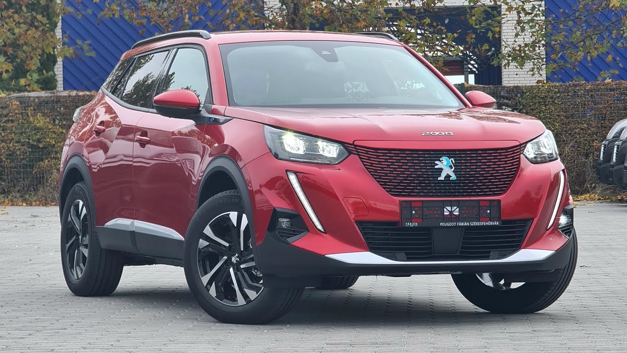 Peugeot e-2008 eAllure Pack 50kWh 100kW (136ch) Elixir Red - YouTube
