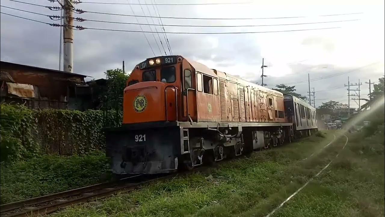 PNR EMU 02 hauled by DEL 921, Passing Manila Wye - YouTube
