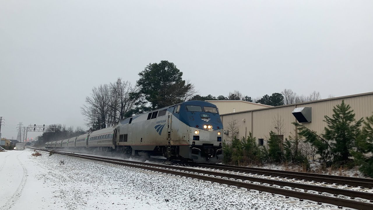 Amtrak 174 Dashes through the snow - YouTube