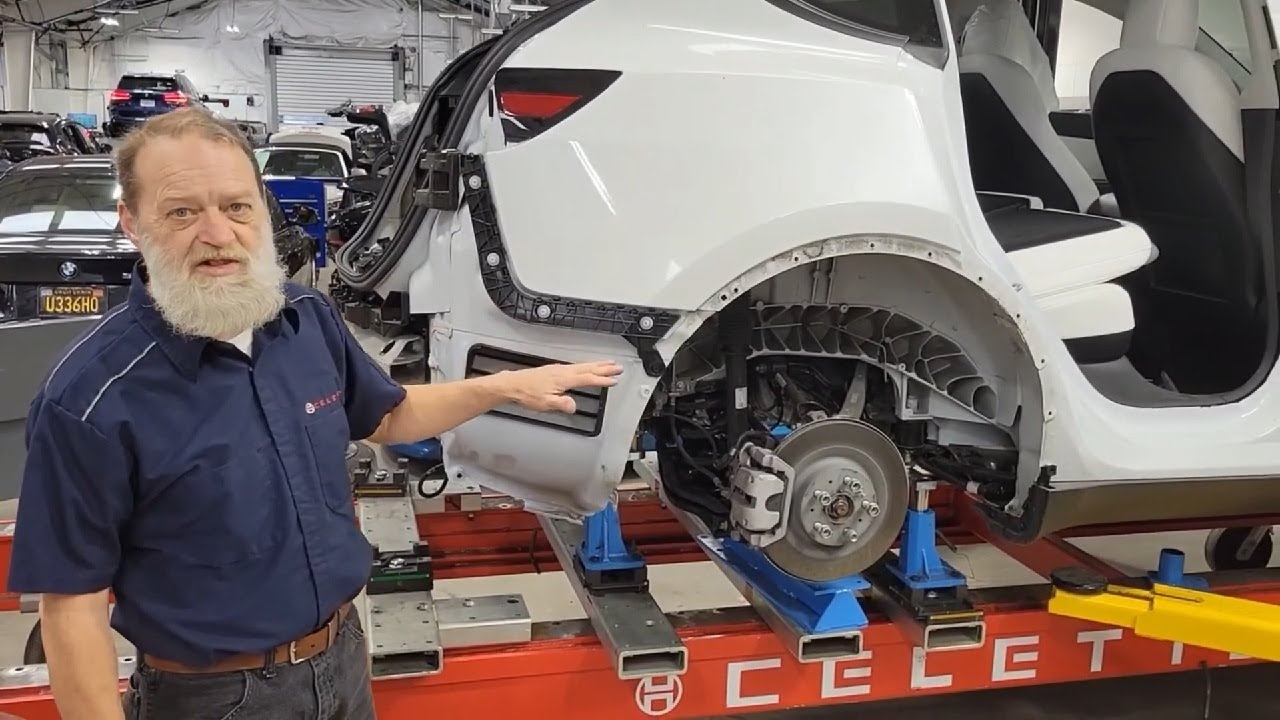 Benching damaged Tesla on Celette universal jigs with side gantry - YouTube