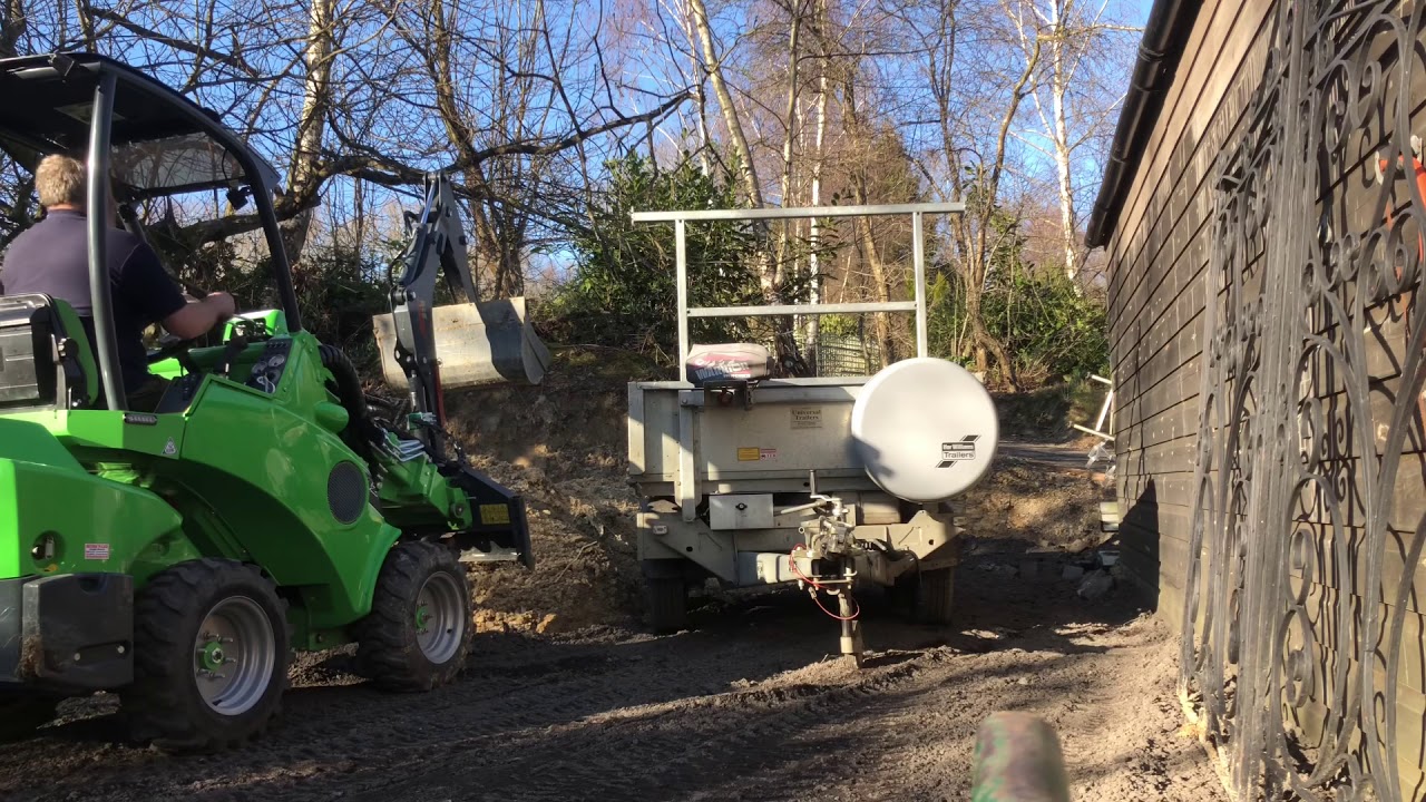 Avant loader 423 with 210 backhoe - YouTube