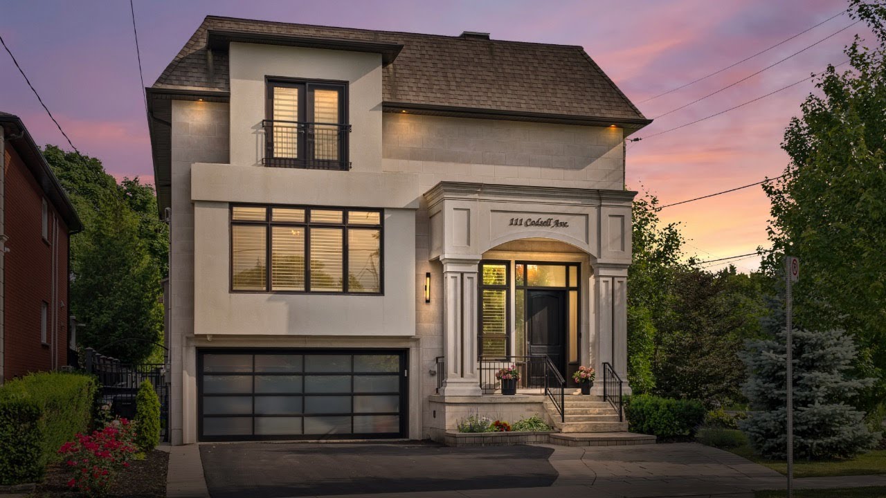 Experience the epitome of luxury in this stunning three-level home ...