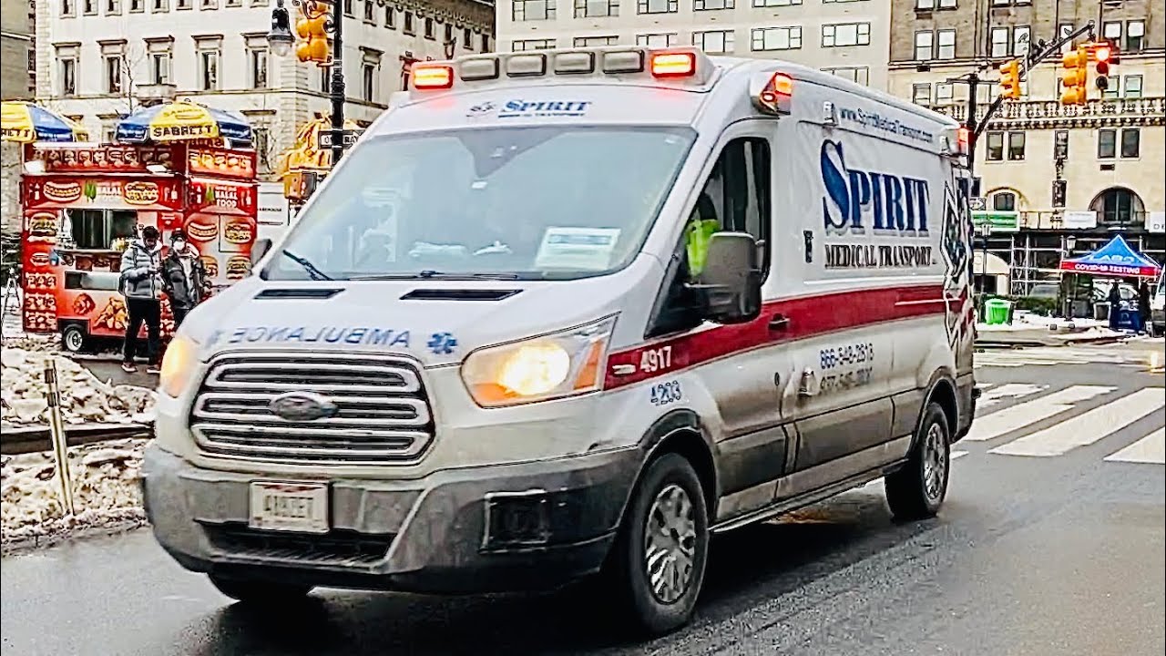 SPIRIT EMS AMBULANCE RESPONDING ON CENTRAL PARK SOUTH IN MIDTOWN AREA ...