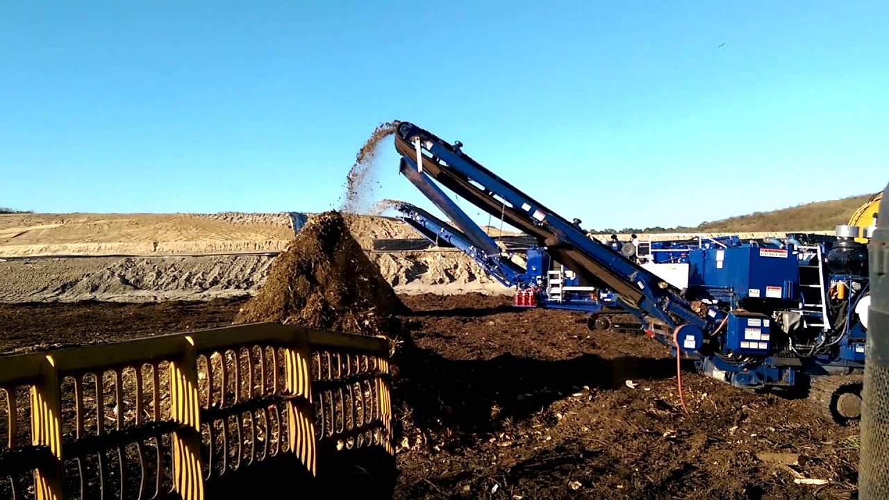 Peterson grinders at the landfill - YouTube