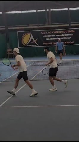 Tennyson Whiting serving with the two-handled tennis racket - YouTube