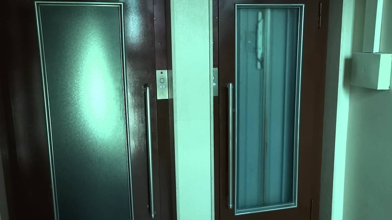 Two modernized Schindler elevators - YouTube