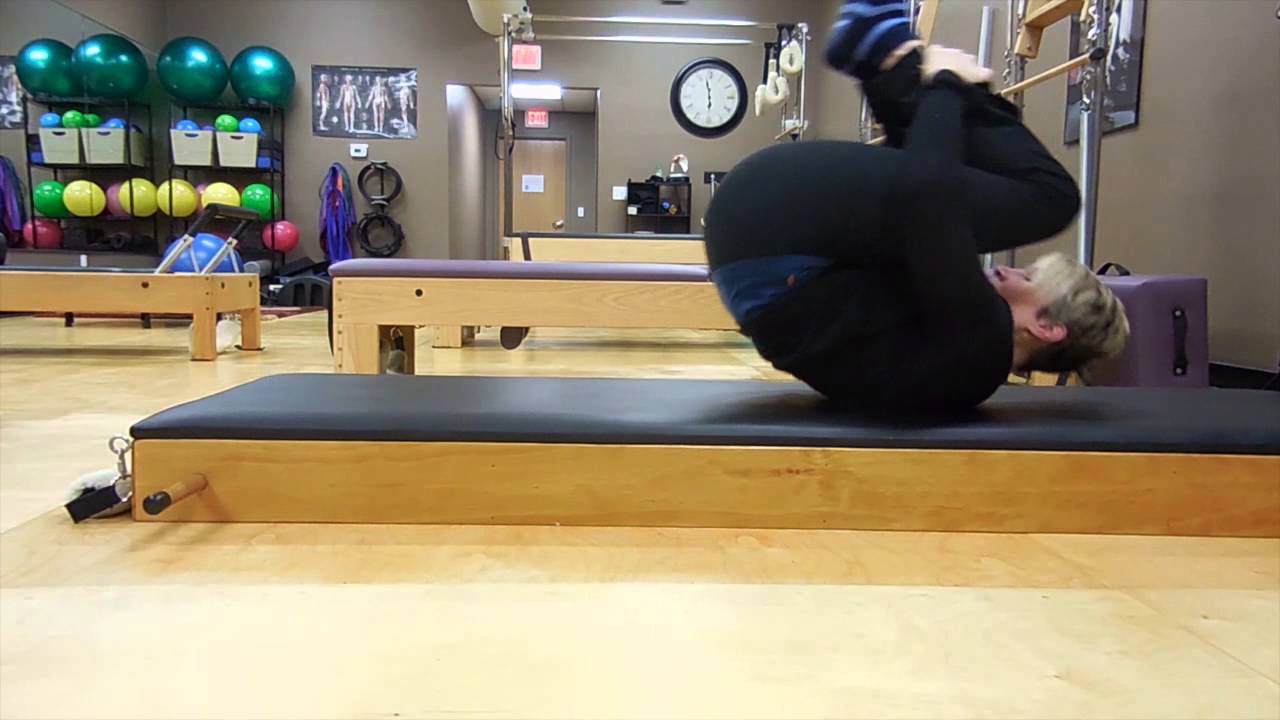 Pilates Rolling Back - YouTube