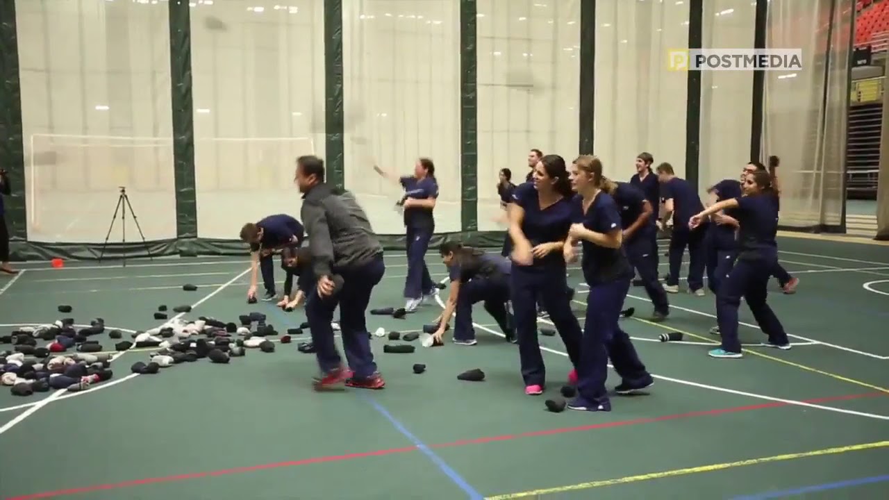 Students hold sock fight and help the homeless - YouTube