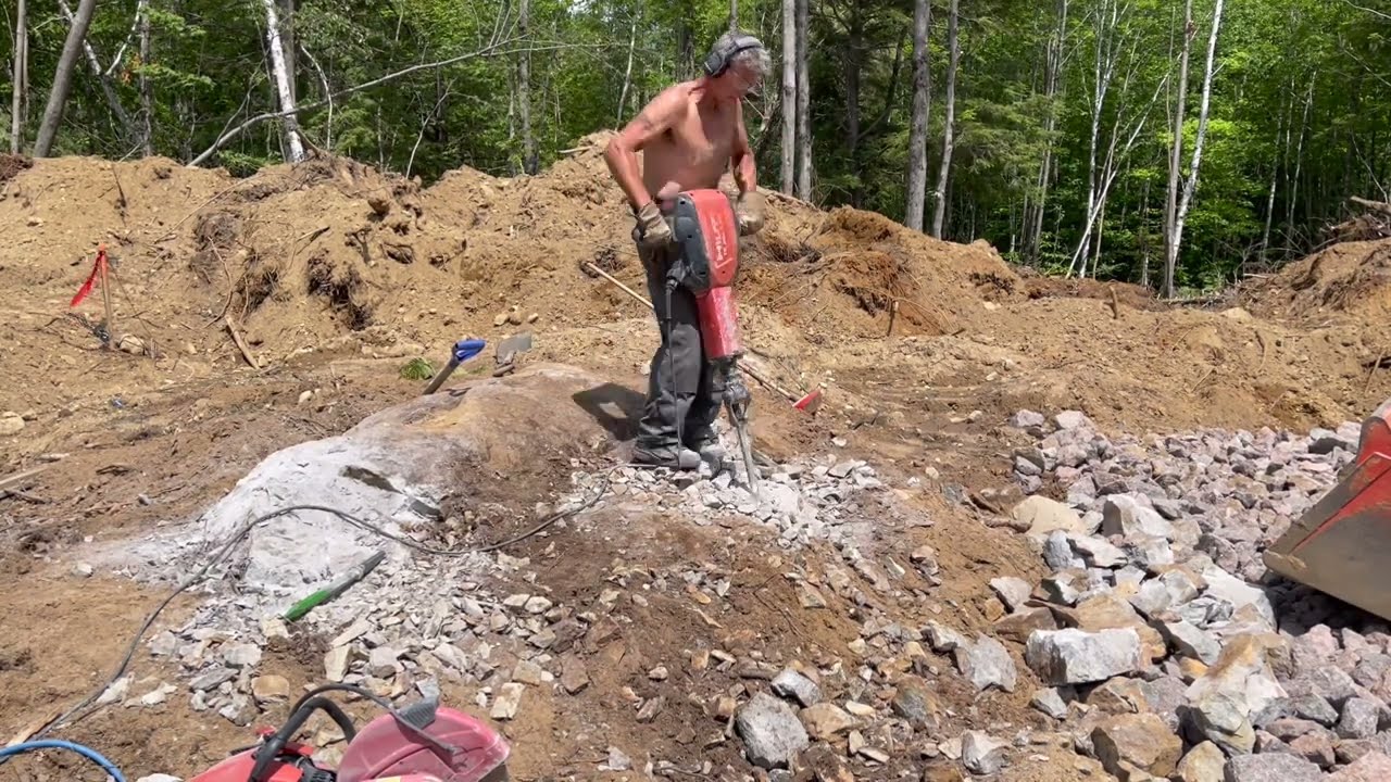 Bedrock removal with jackhammer - YouTube
