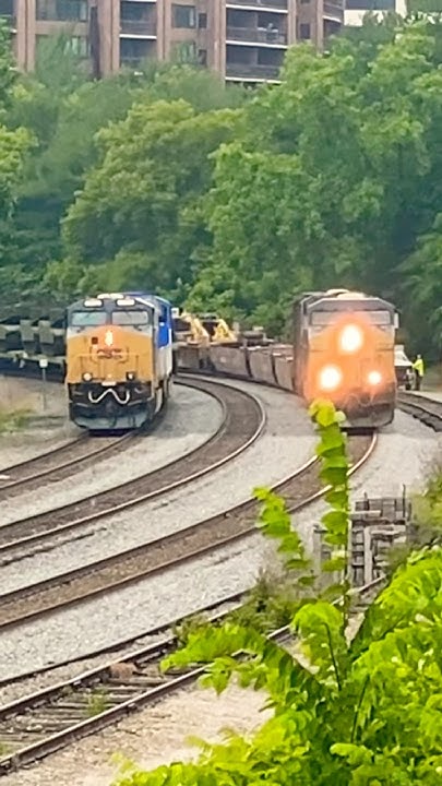 CSX I032-06 races S554-04! #csx #railfanning #railroad #railway #militarytrain #shorts - YouTube