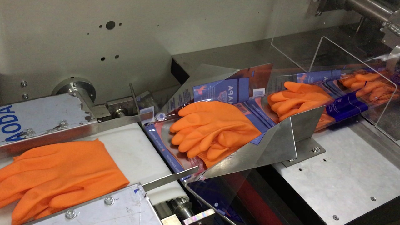 gloves horizontal sealing filling packing machine KT-450X - YouTube