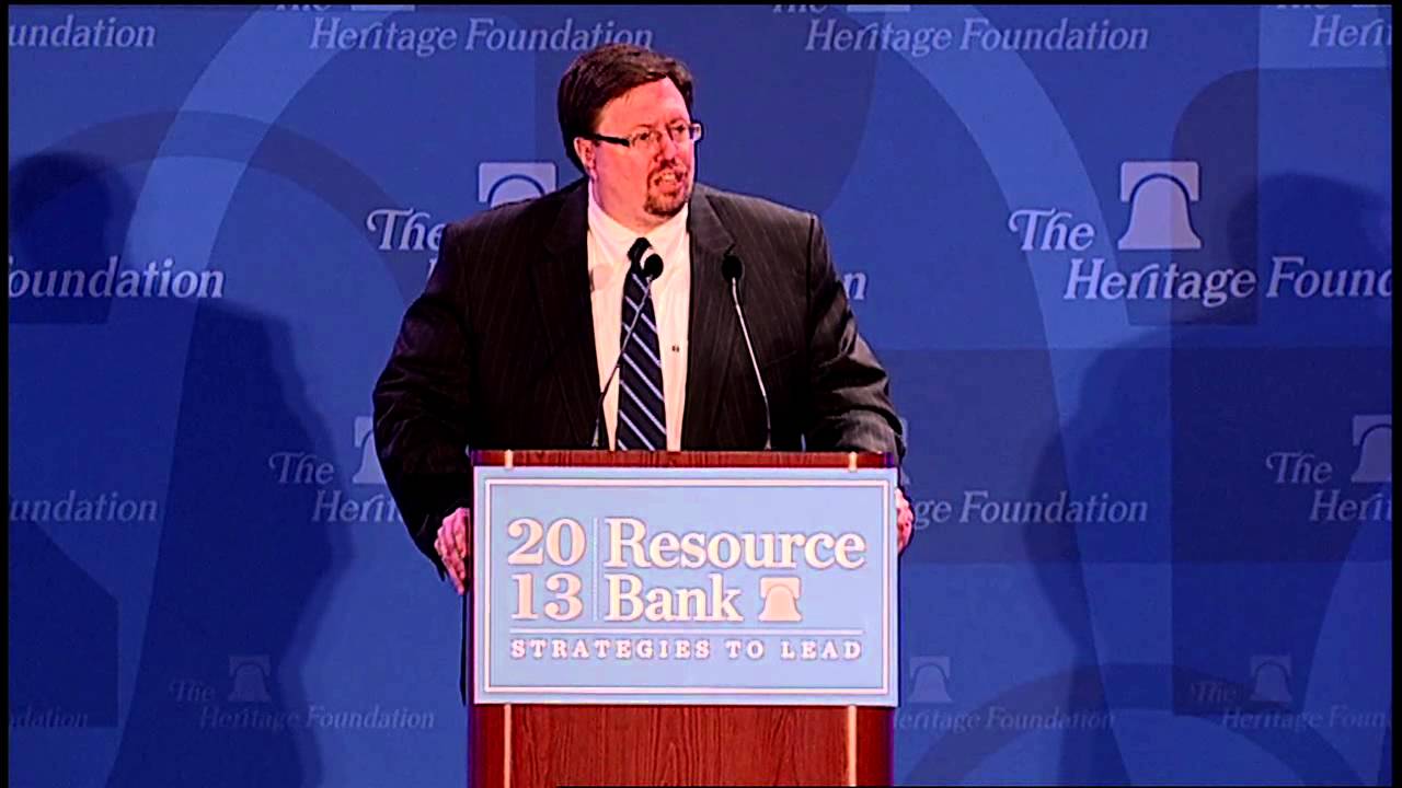 Jason Stverak and Larry Solov present the 2013 Breitbart Award to ...