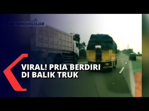 Viral! Seorang Pria Berdiri Menempel di Bagian Belakang Truk di Jalan Tol!