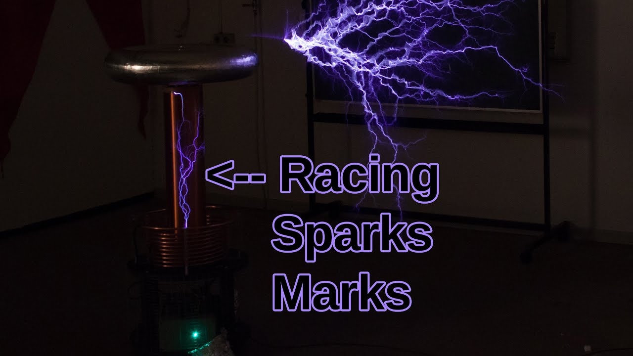 Tesla Coil Racing Sparks Burned Into Secondary Coil - YouTube