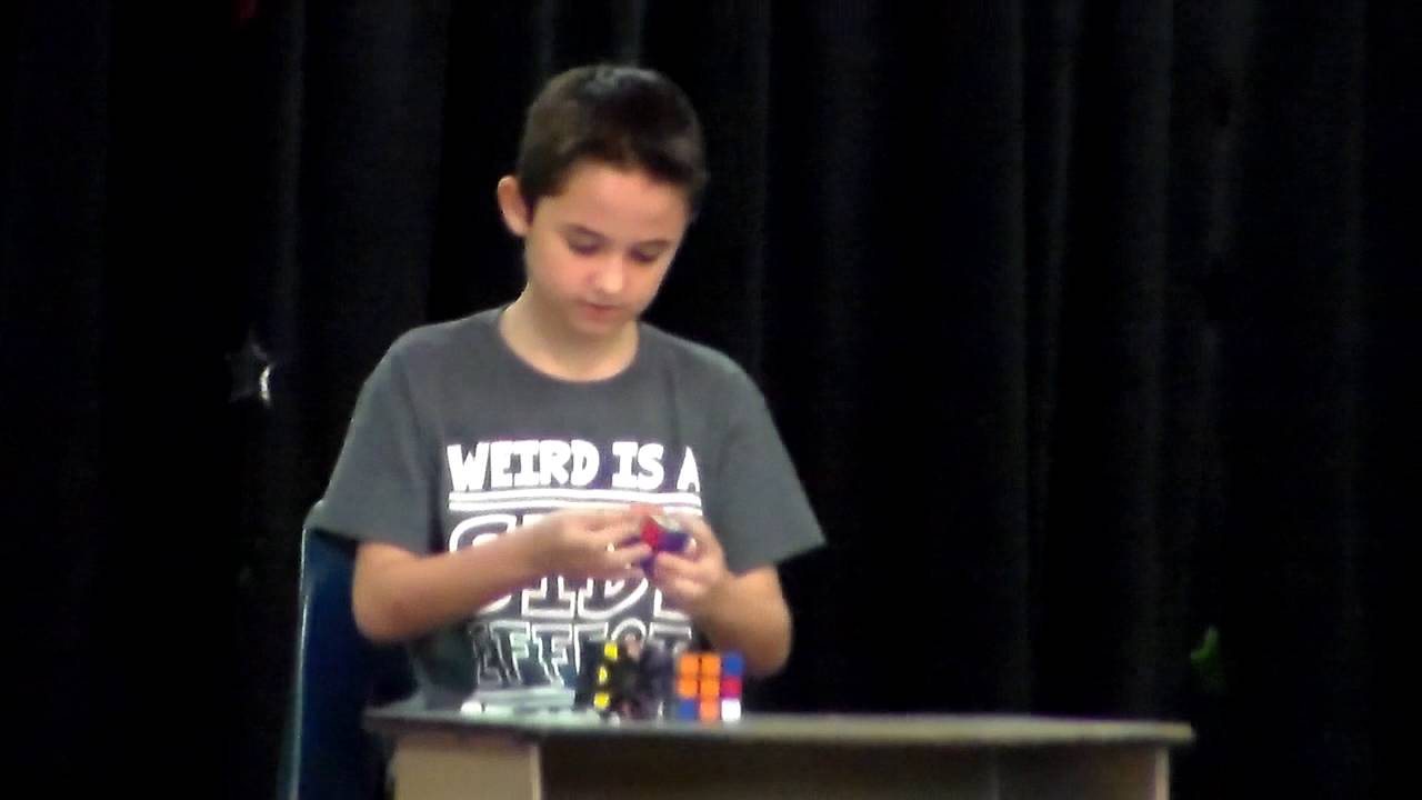 Bryce solving his Rubiks Cubes - Talent Show 2016 - YouTube