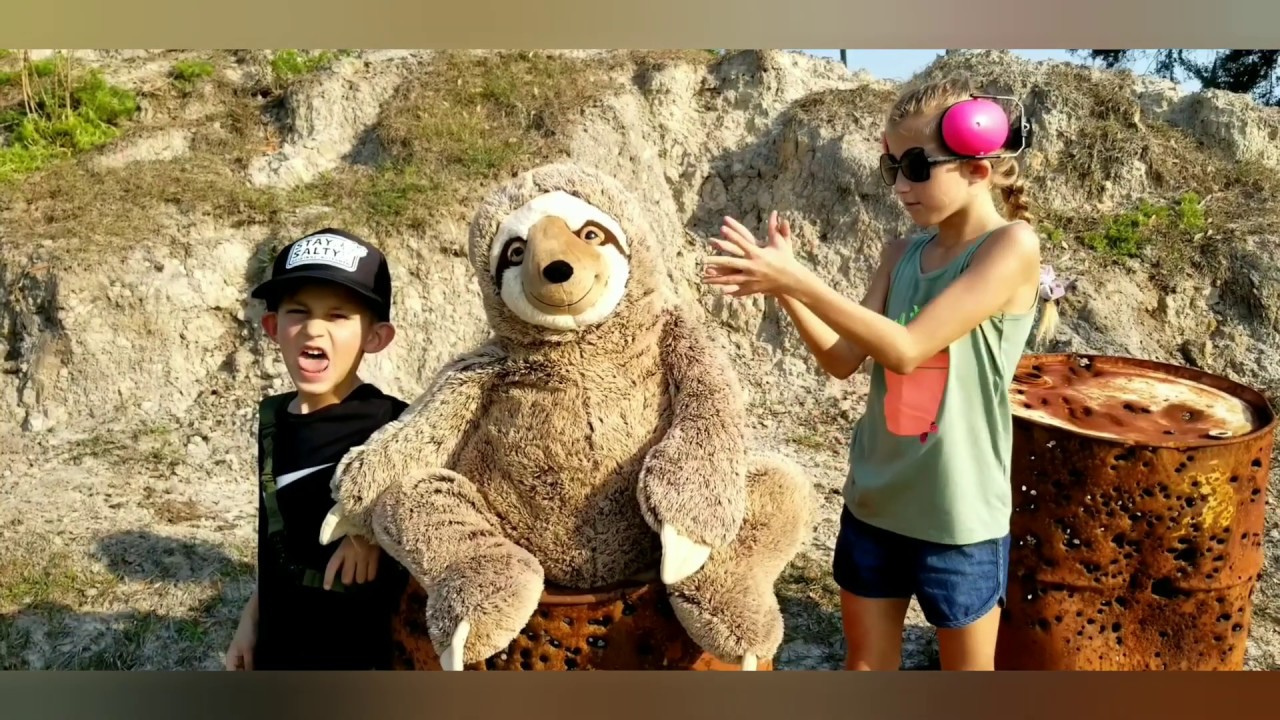 9 Year Old Girl Shooting AR-15 at Giant Sloth Stuffed with Tannerite ...