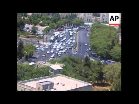 Driver rams bulldozer into Jerusalem bus, 1 dead, at least 30 injured