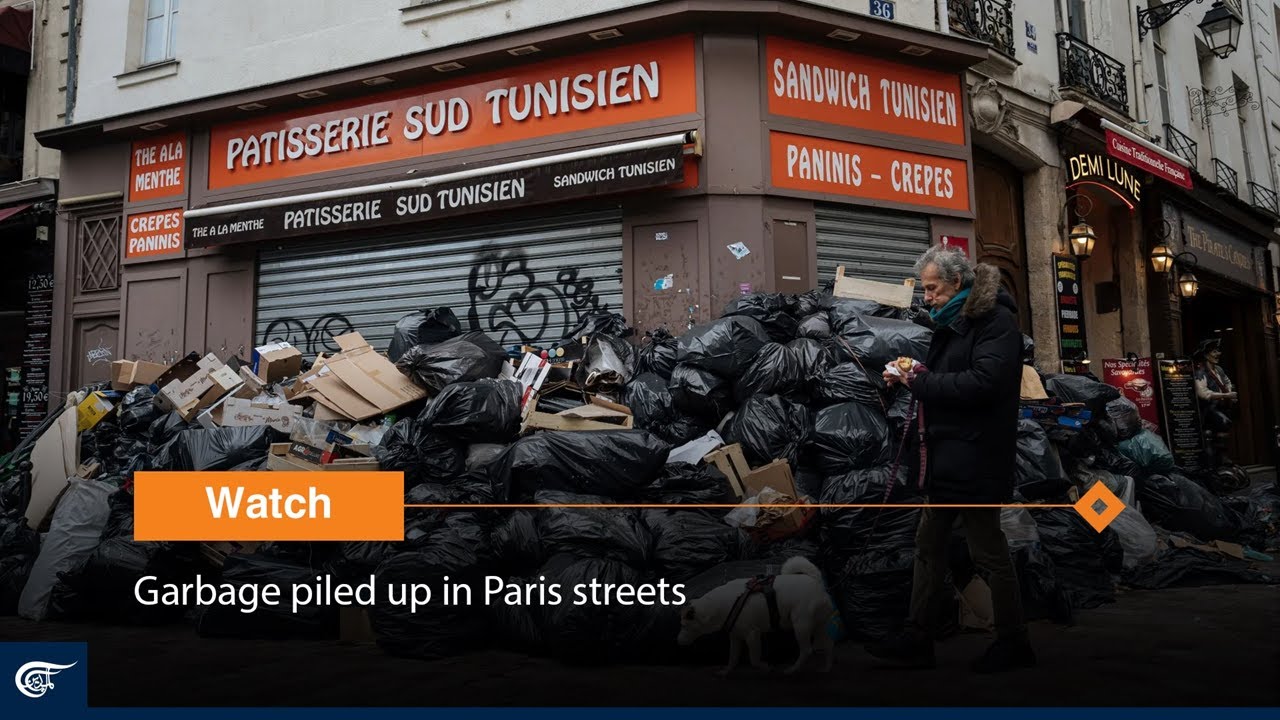 Garbage piled up in Paris streets - YouTube