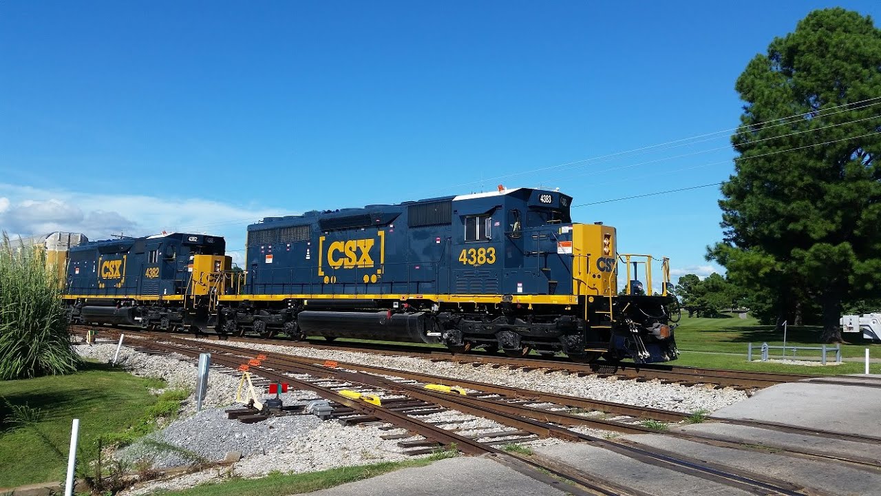 CSX 4383 and CSX 4382 pull a CSX Autorack Train across Broadway Ave in ...