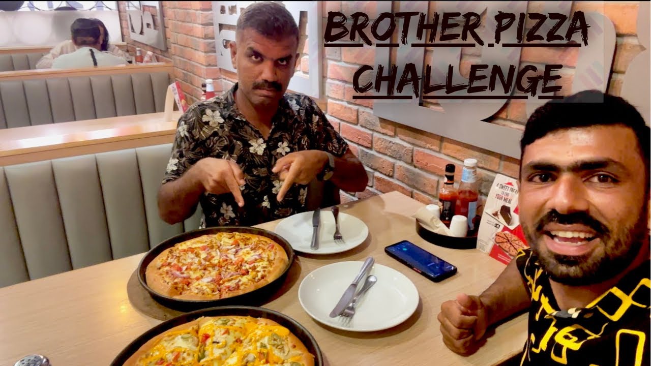 LARGE PIZZA CHALLENGE WITH BROTHER IN DUBAI PIZZA HUT - YouTube