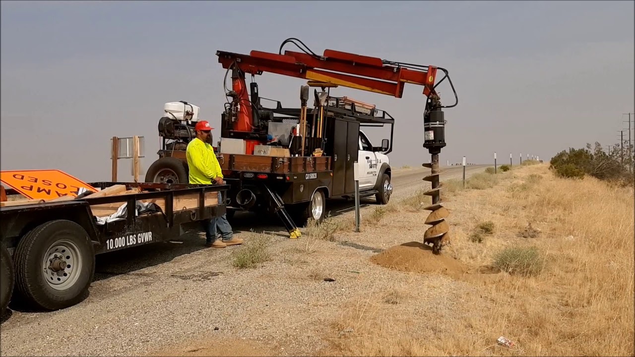 Highway Installation of Road Sign using UtilityWorker Auger by Mojave ...